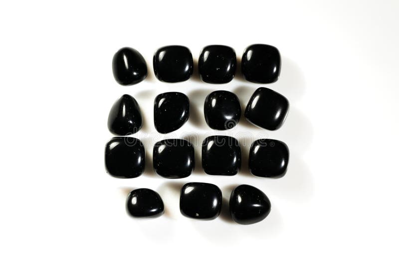 Polished Black Natural Onyx Gemstones Arranged in Grid Pattern on White ...