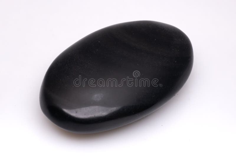 Polished Black River Stone Isolated on a White Background with Subtle ...