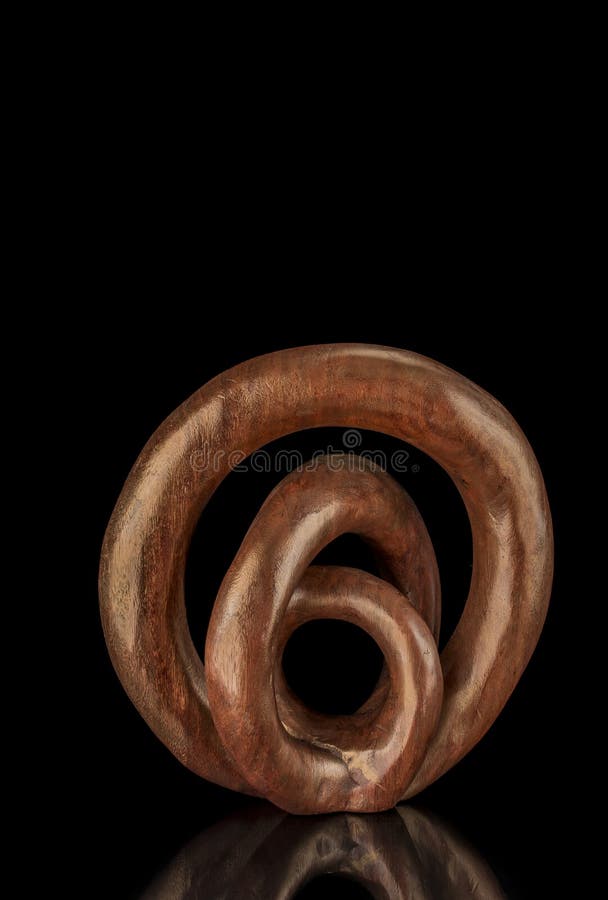 Polished, Painted Gold Loop Abstract Sculpture in Black Stock Image ...