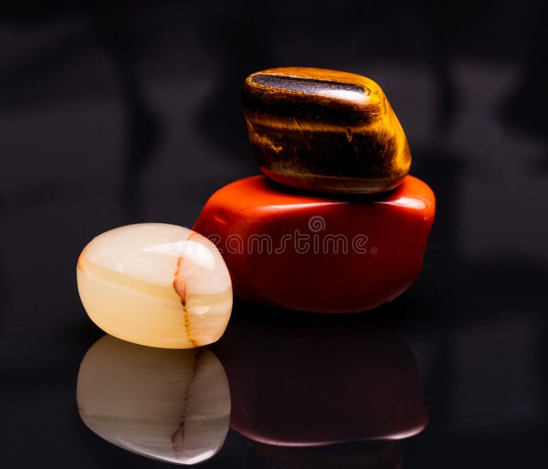 Polished Red Jasper, Onyx and Tiger-eye Stones Stock Image - Image of ...