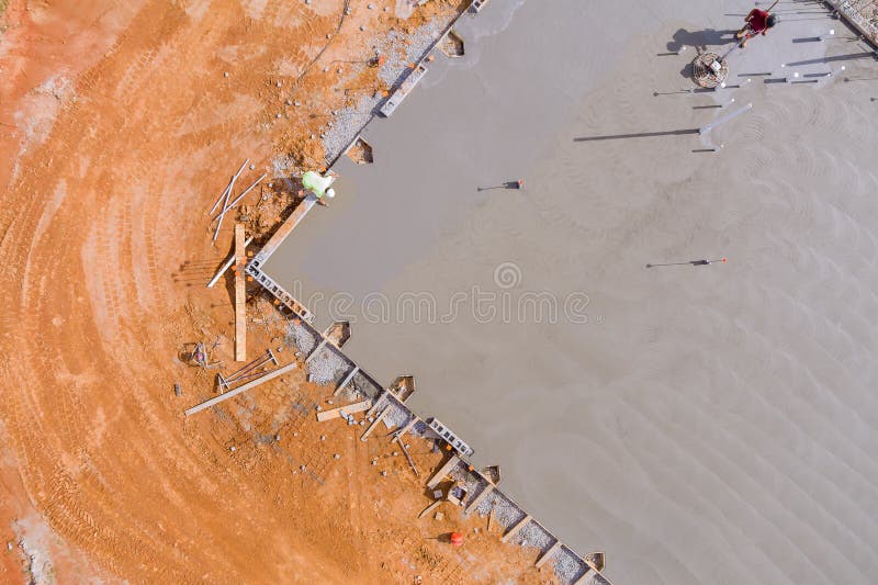 Polishing and Leveling the Cement Screed Mortar Floor on a Construction ...