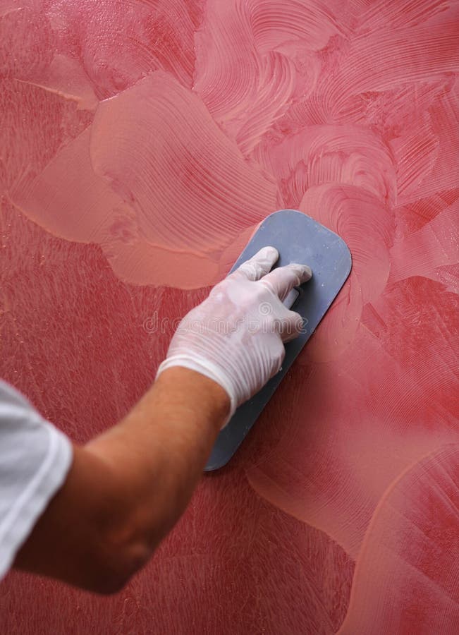 Polishing plastered walls stock image. Image of hand - 68199369