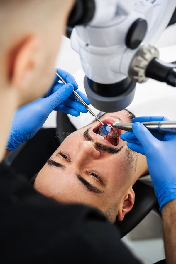 Polishing Teeth with Digital Microscope in Stomatology Clinic. Digital ...
