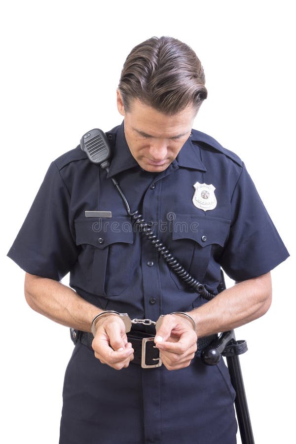 Politieman in handcuffs stock foto. Image of wapenstok - 63843450