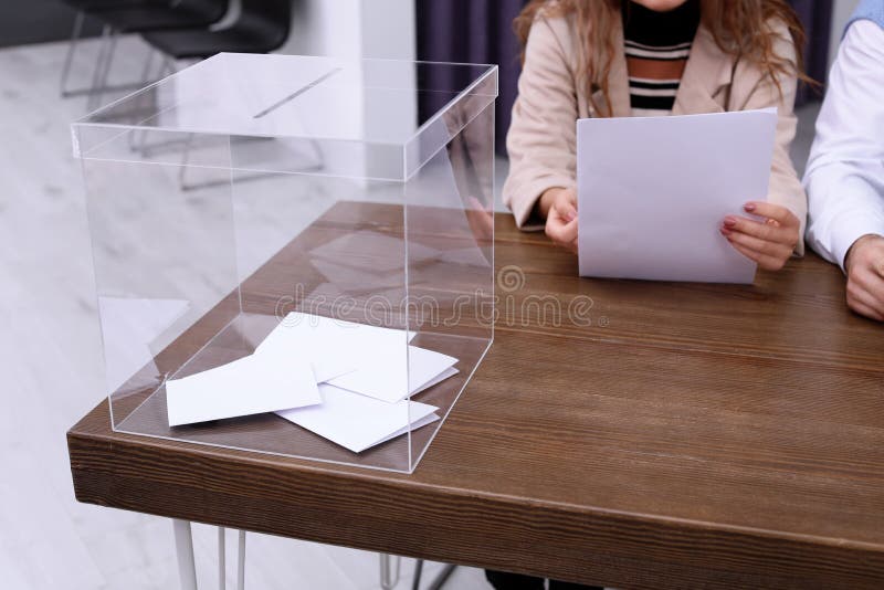 Polling Station Workers at Table Stock Image - Image of opinion, elect ...