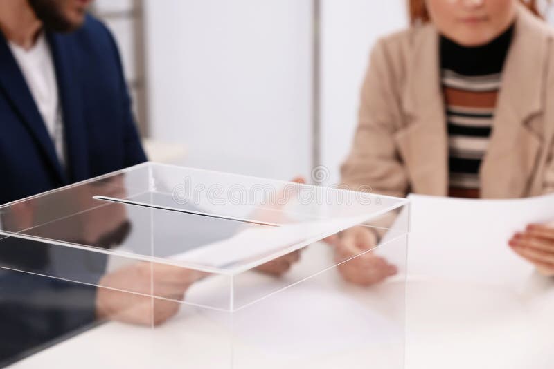 Polling Station Workers at Table with Ballot Stock Image - Image of ...