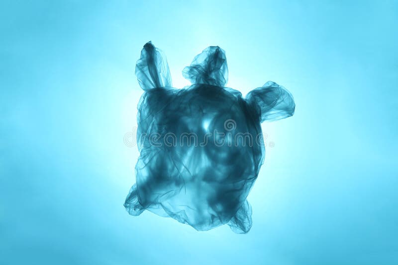Pollution of the Environment of the Planet Plastic. Blue Plastic Bag in ...