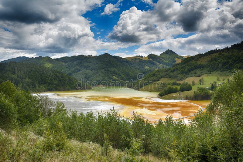 Pollution of a Lake with Contaminated Water from a Gold Mine. Stock ...