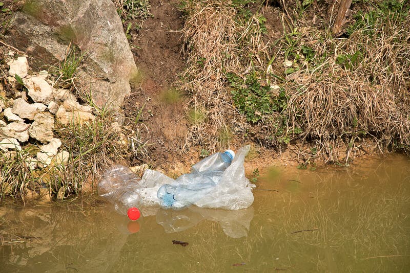 Pollution of Plastic in Water. Plastic Waste Floats in Water ...