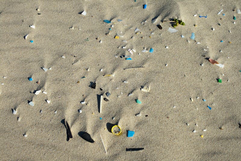 Pollution with Plastics and Microplastics in the Beach Sand Stock Photo ...