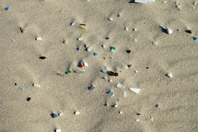 Pollution with Plastics and Microplastics in the Beach Sand Stock Photo ...