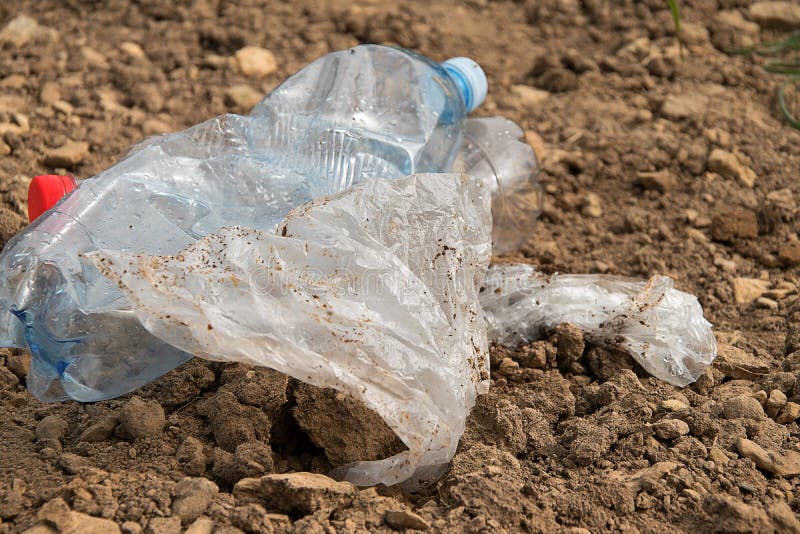 Pollution of Plastics on the Ground. Plastic Waste Lies on the Ground ...