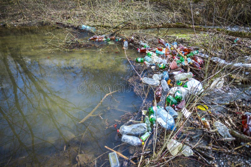 Springtime Landscape with Garbage on the River Stock Photo - Image of ...