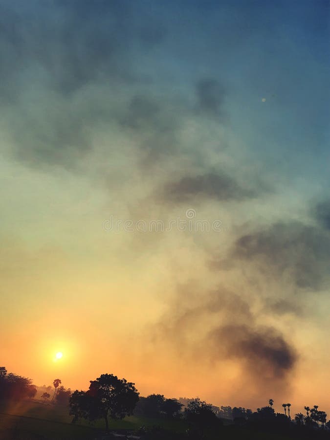 Pollution at Sun Set with Heavenly Bodies on Sky at Evening Time Stock ...