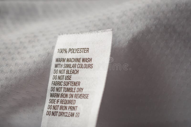 Polyester Fabric Clothing Label with Laundry Instructions Stock Photo ...