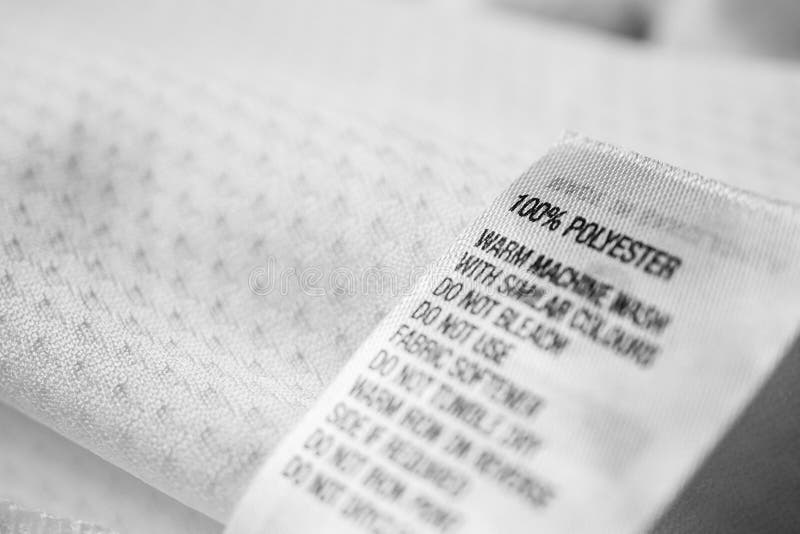 Polyester Fabric Clothing Label with Laundry Instructions Stock Photo ...