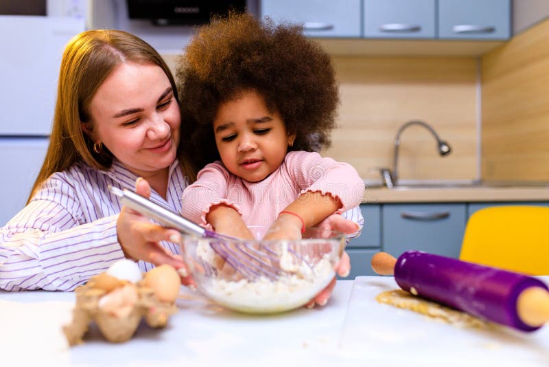 Polyethnic Family Cooking Biscuits, Make Breakfast at Home Together ...