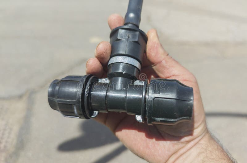 Polyethylene T Connection for Irrigation System Stock Photo - Image of ...
