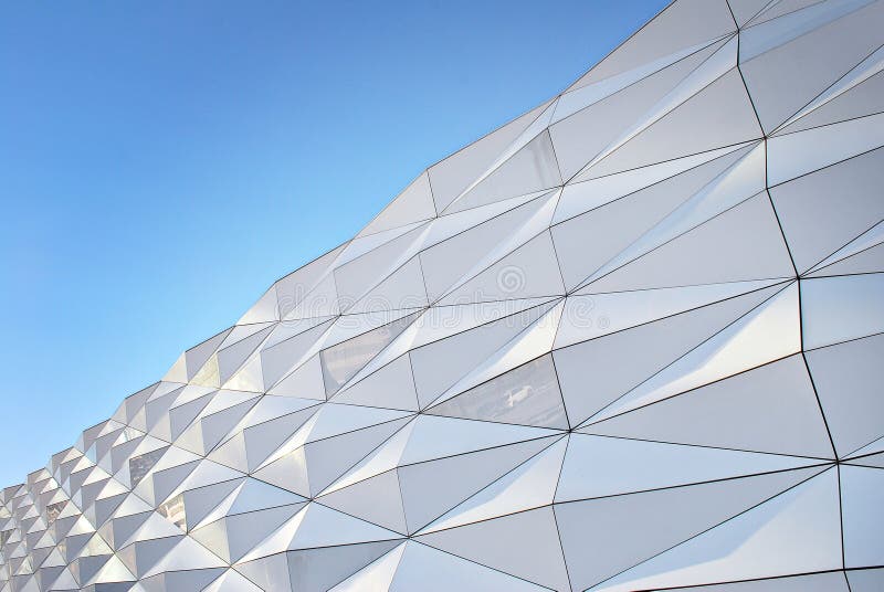 Polygonal Triangle Glass Facade of Modern Building. Stock Image - Image ...