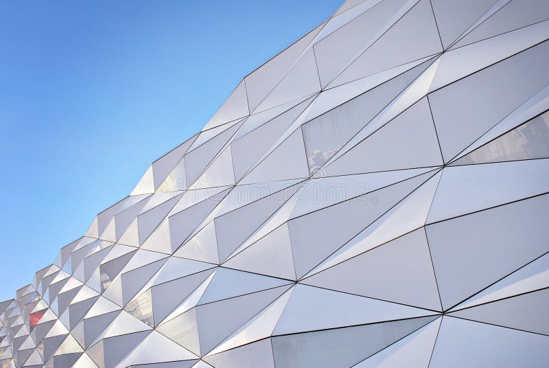 Polygonal Triangle Glass Facade of Modern Building. Stock Image - Image ...