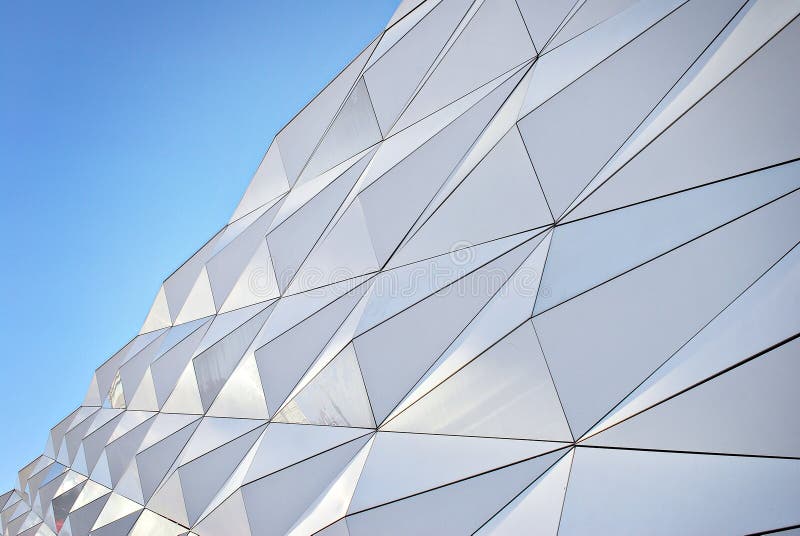 Polygonal Triangle Glass Facade of Modern Building. Stock Image - Image ...