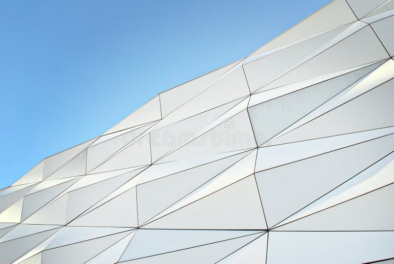 Polygonal Triangle Glass Facade of Modern Building. Stock Image - Image ...
