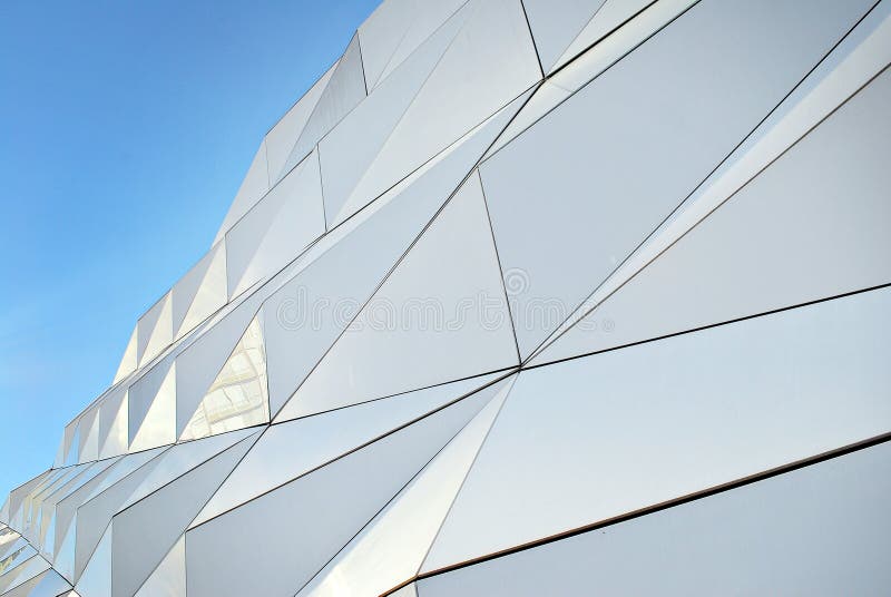 Polygonal Triangle Glass Facade of Modern Building. Stock Image - Image ...