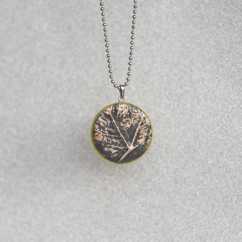 Polymer Clay Leaf Texture Pendant Stock Image - Image of girl, gold ...