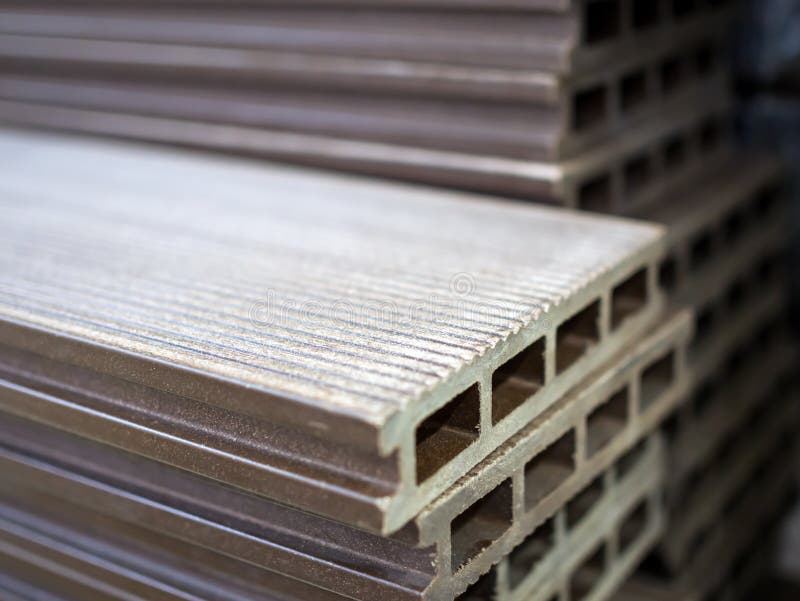 Polymer Decking Board Stacked in a Building Materials Warehouse Stock ...