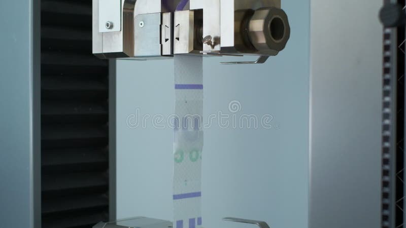 Polymer Tape is Installed To Strength Test Machine in Slow Motion Stock ...