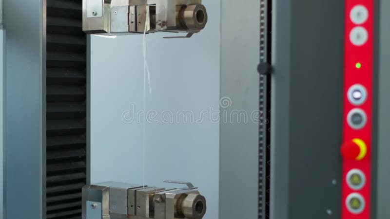 Polymer Thread Sample Tape is Tested for Strength Stock Video - Video ...