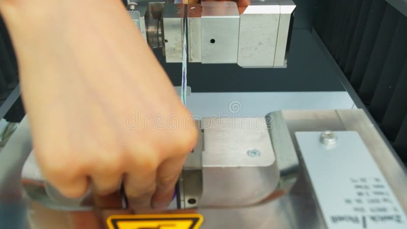 Polymer Thread Sample Tape is Tested for Strength in Slow Motion Stock ...