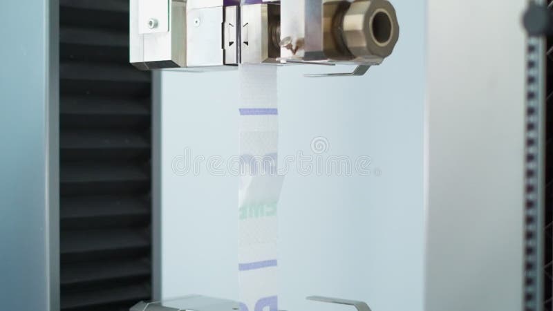 Polymer Tape is Installed To Strength Test Machine in Slow Motion Stock ...