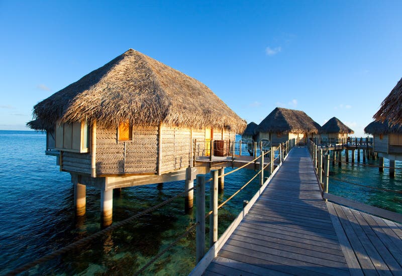 Polynesian Landscape -small Houses on Water. Stock Photo - Image of ...