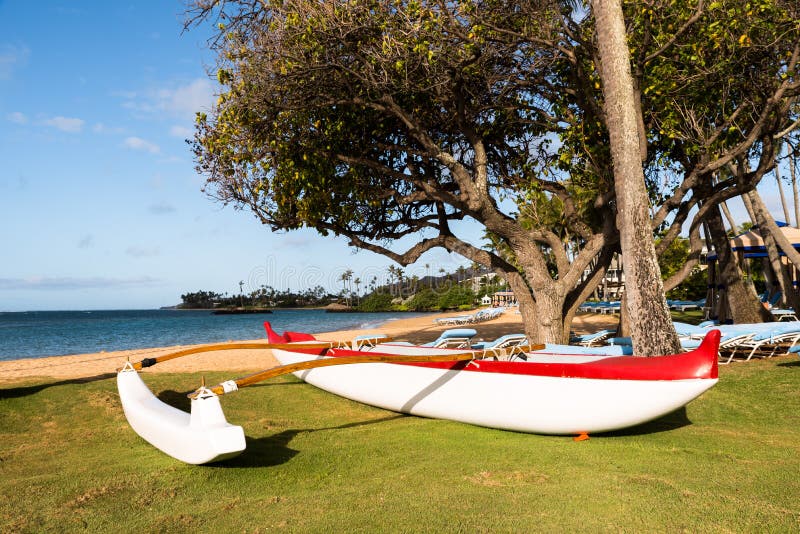 Polynesian Outrigger Canoe on the Beach Stock Photo - Image of hawaii ...