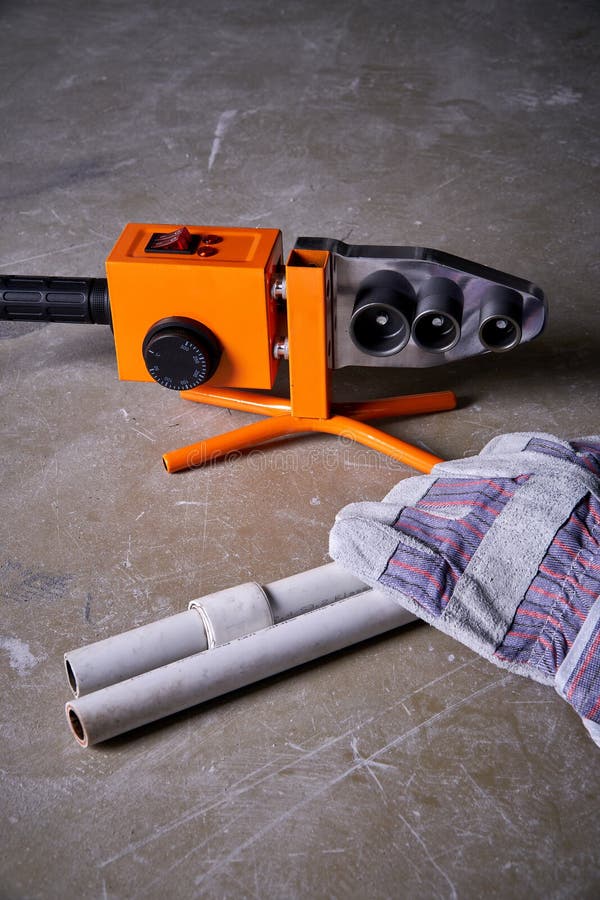 Polypropylene Pipe and Gloves Solder. Work Tool Stock Image - Image of ...