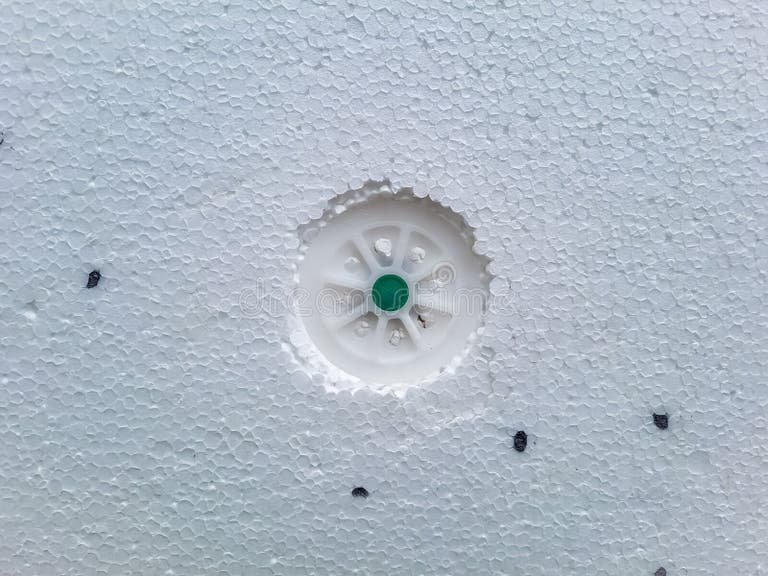Polystyrene for Insulation on Plastic Fasteners. Concept of Home ...