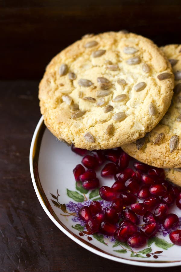 Pomegranate and cookies stock photo. Image of grain, saucer - 49442058