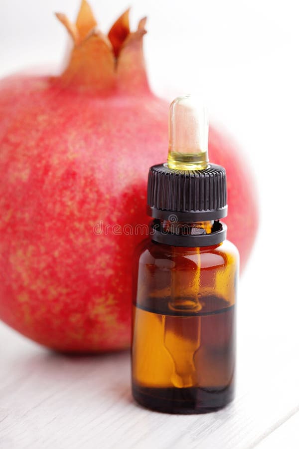 Pomegranate essential oil stock photo. Image of essence - 43421128