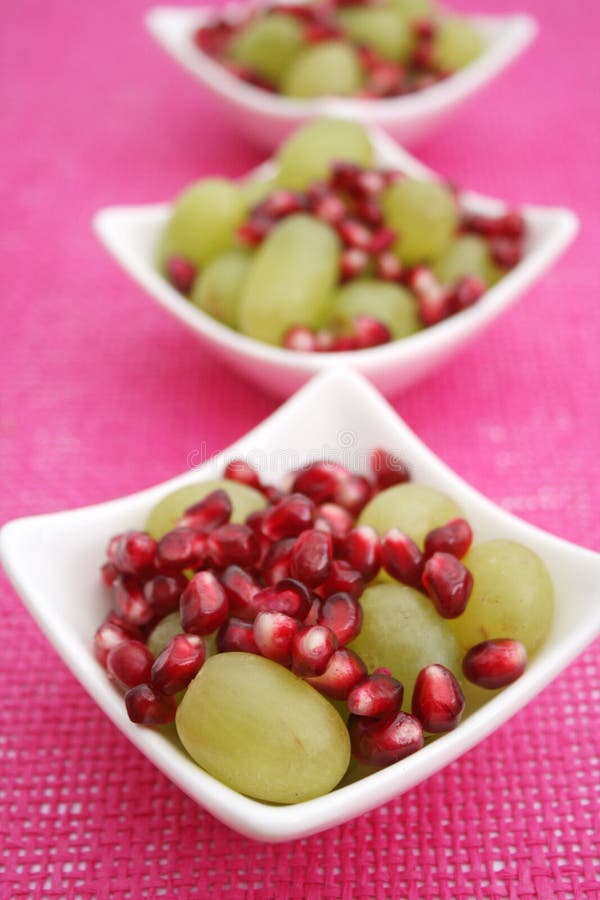 Pomegranate and grapes stock photo. Image of seeds, appetizer - 11509034