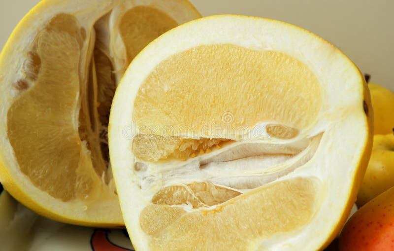 Pomelo, cut in half stock photo. Image of healthy, eating - 38537986