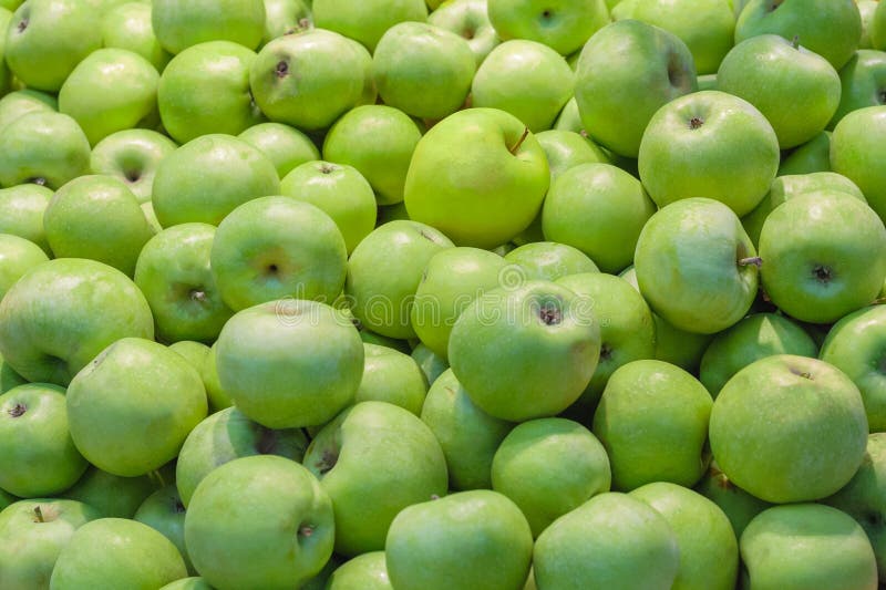 Fond vert de pommes image stock. Image du nutritif, couleur - 63843337