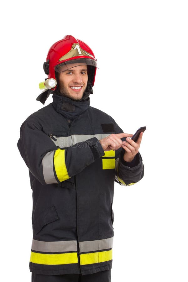Pompiere Che Per Mezzo Dello Smart Phone. Fotografia Stock - Immagine ...