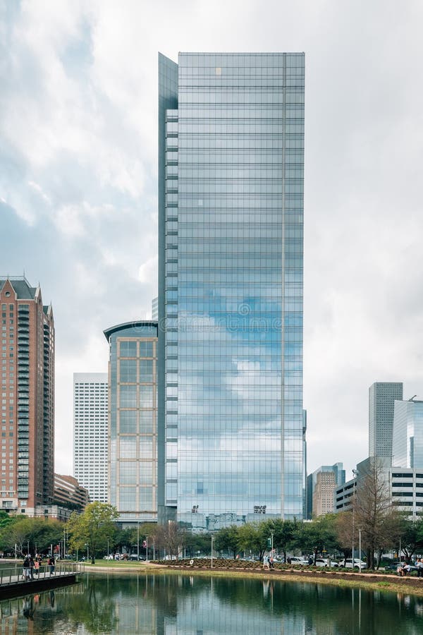 Pond at the Discovery Green and Modern Buildings in Downtown Houston ...