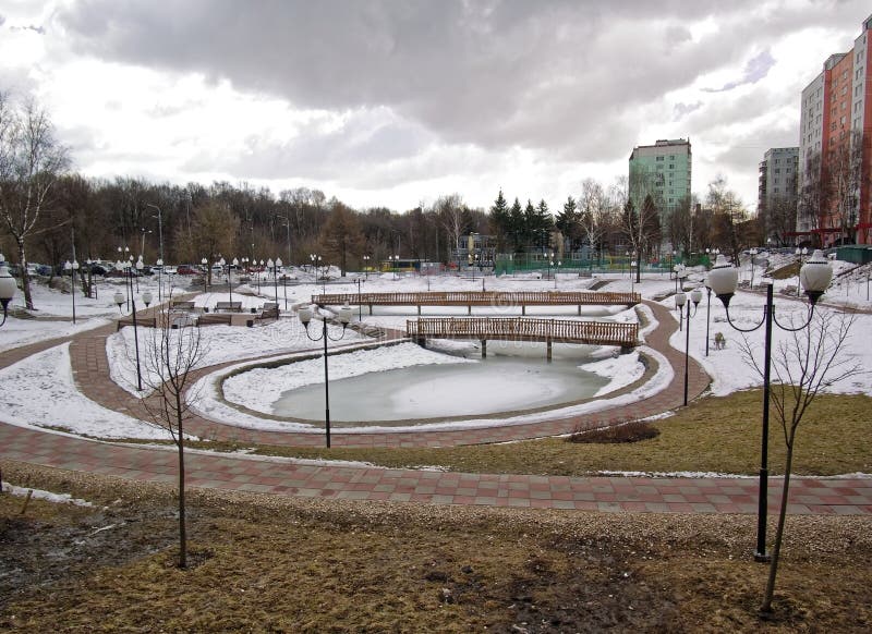 The Pond Ice is Still Melting in Spring Stock Photo - Image of december ...