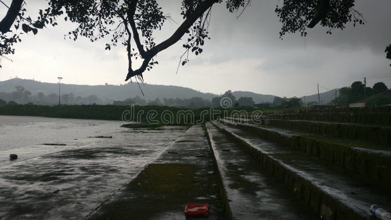 Pond editorial image. Image of rainy, trees, mountain - 133384200