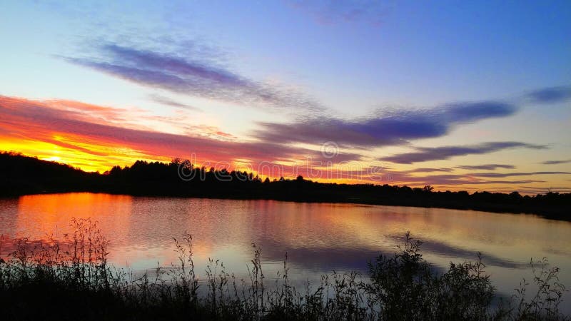 Pond at sunset stock image. Image of pond, peaceful - 137595541