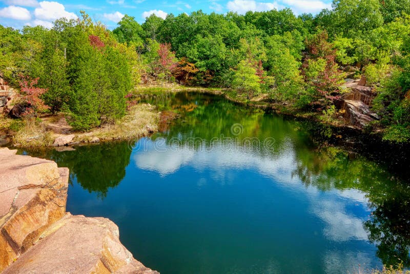 Pond Surrounded by Rocks and Greenery Under the Sunlight - Perfect for ...