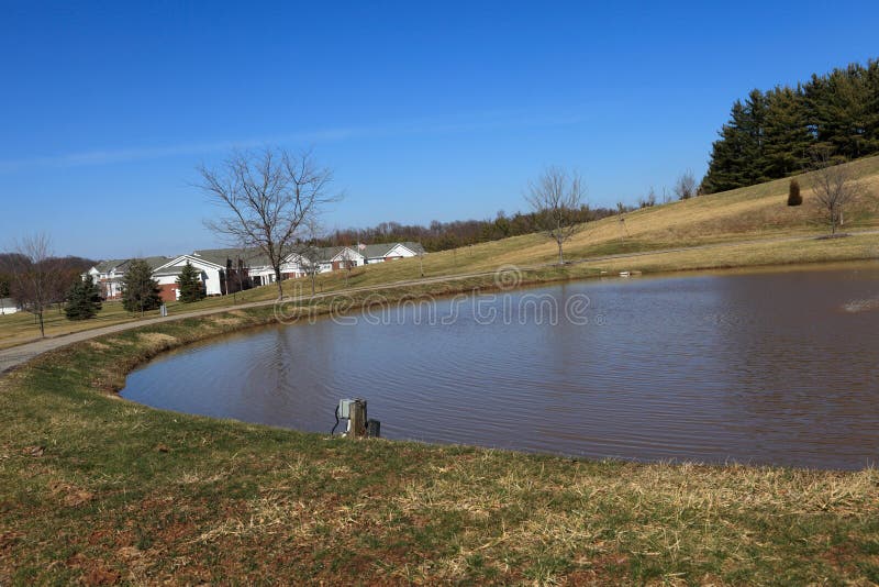 Pond in village stock photo. Image of place, houses, rural - 19340096