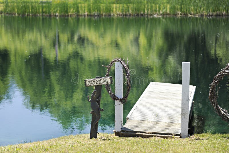Pond warning signs stock image. Image of pond, park - 113180063